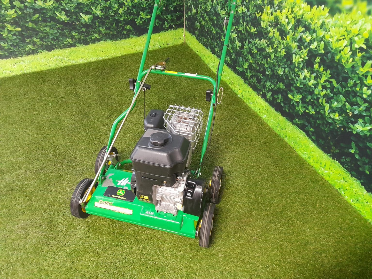 John Deere D45C verticuteermachine - Kortier Mechanisatie